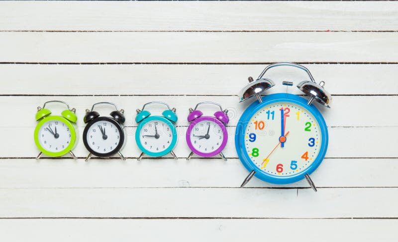 Five Clocks Of Different Times Stock Image - Image of deadline, night ...