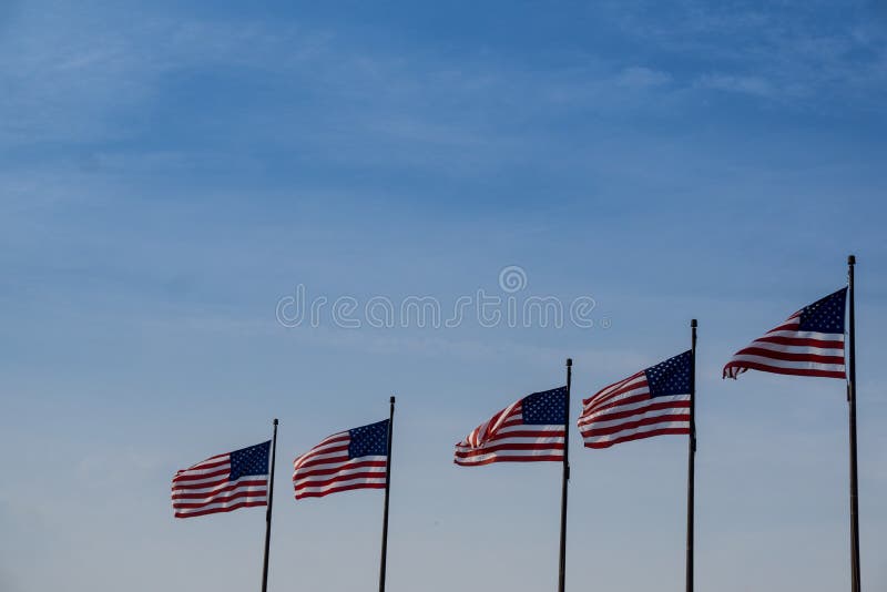 Five American Flags in Front of a Blue Sky Stock Image - Image of five ...