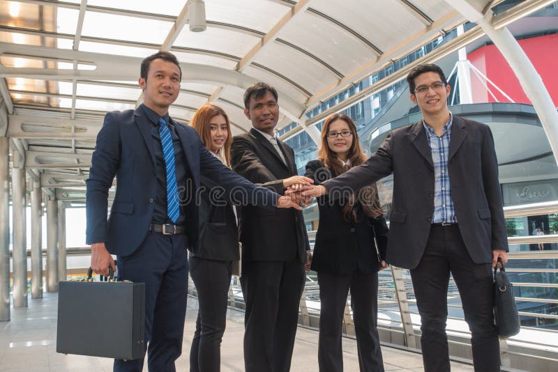 Five Asian Business Teamwork with Group of People with Hands Together ...