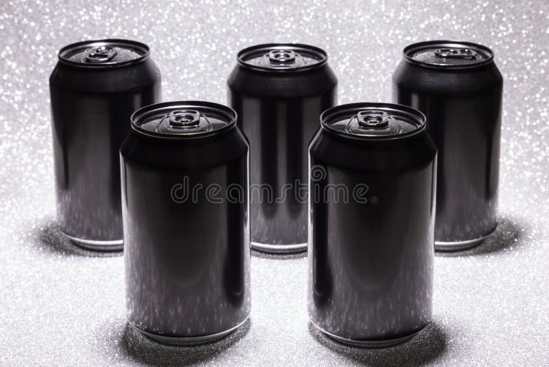 Five Black Blank Aluminium Cans on a White Background with Glitter ...