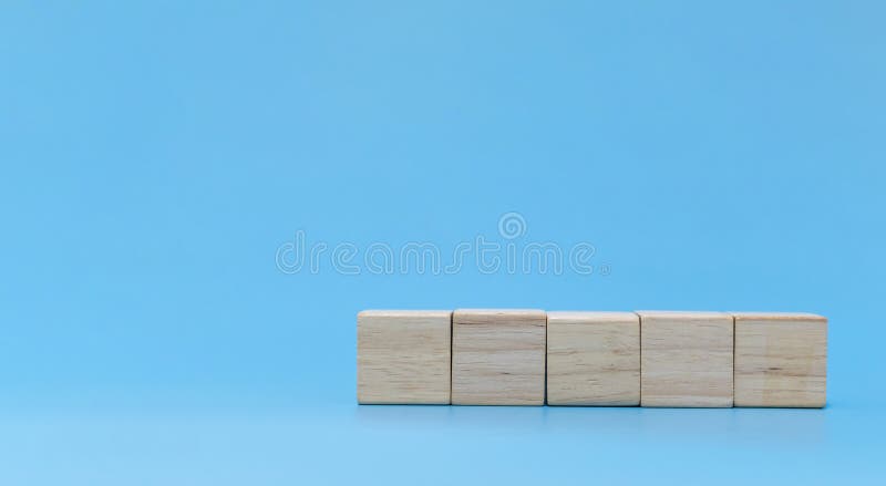 Five Blank Wooden Cube Block Stack on Blue Background with Copy Space ...
