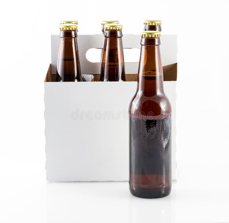Five Bottles of Beer in Cardboard Carrier Stock Photo - Image of drink ...