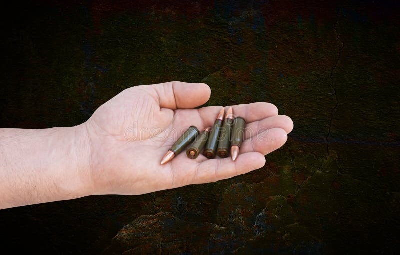 Five Bullets for the Weapon Stock Image - Image of crack, cartridge ...