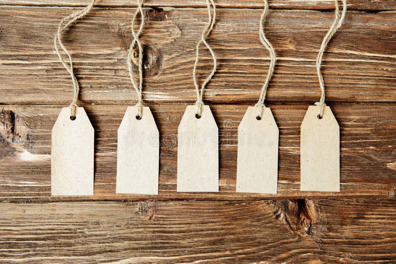 The Five Card Badges with Ropes on Wooden Table Stock Image - Image of ...