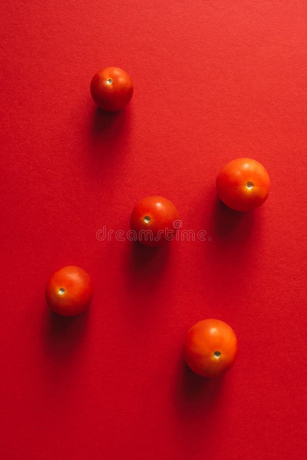 Five Cherry Tomatoes on a Red Background. Stock Photo - Image of fresh ...