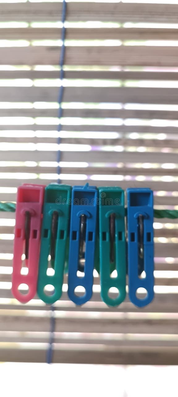 Five Clothes Pins on the Clothesline Stock Photo - Image of clothes ...