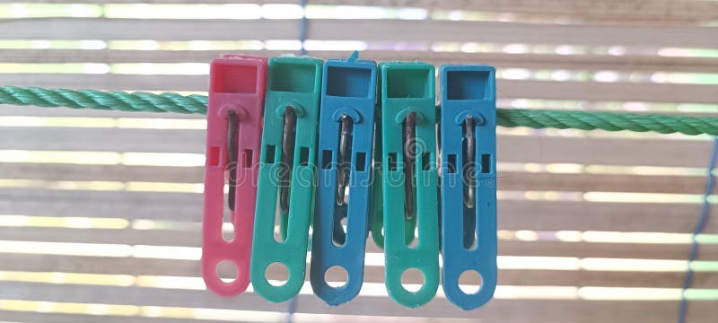 Five Clothes Pins on the Clothesline Stock Photo - Image of color, pins ...