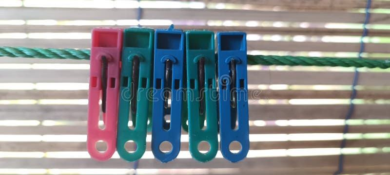 Five Clothes Pins on the Clothesline Stock Photo - Image of clothesline ...