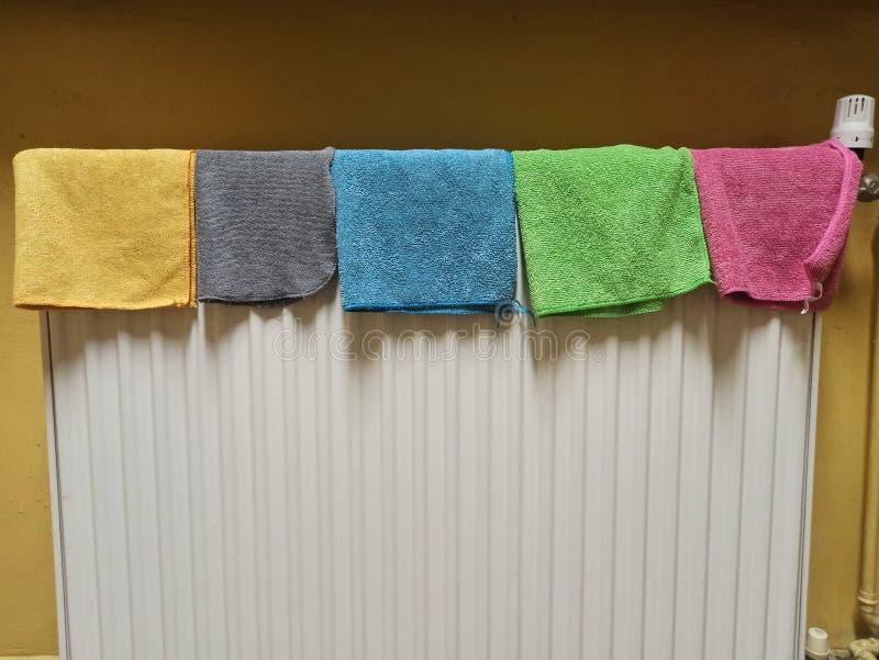 Five Colored, Clean, Washed Cloths on a White Radiator Stock Photo ...