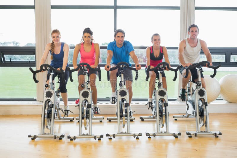 Five People Working Out at Spinning Class Stock Image - Image of studio ...