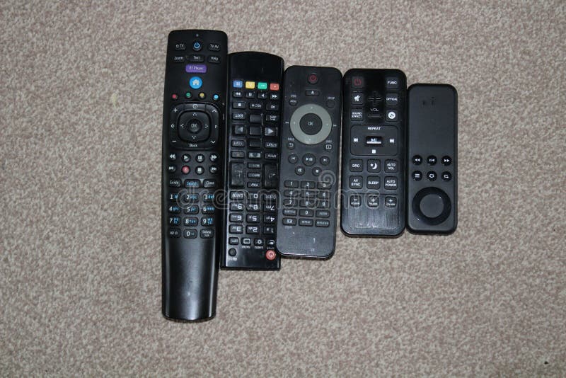 Five Remote Controls Side by Side Stock Photo - Image of controls ...