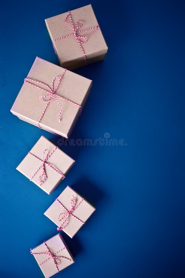 Five Different Sizes Christmas Gift Boxes on the Blue Background ...