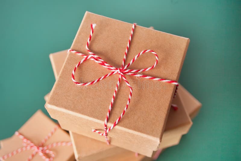 Five Different Sizes Christmas Gift Boxes on the Green Background Stock ...