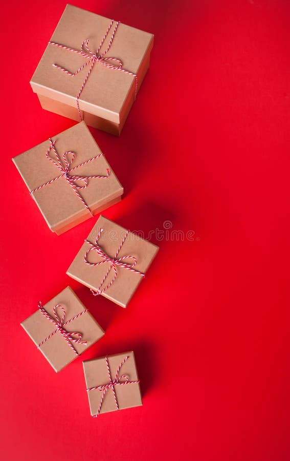 Five Different Sizes Christmas Gift Boxes on the Red Background Stock ...