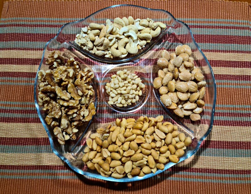 Five Different Types of Nuts on a Special Glass Plate are Served for ...