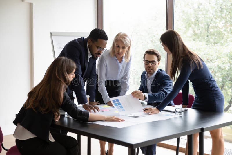 Five Diverse Employees Make Project Research at Group Meeting Stock ...