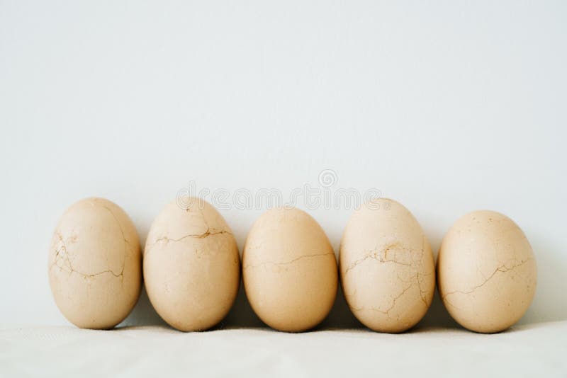 Five Easter Eggs Trendy Pastel Colored with Cracked Shells on a White ...