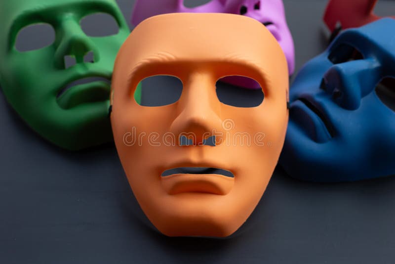 Five face masks on dark stock image. Image of abstract - 211539563