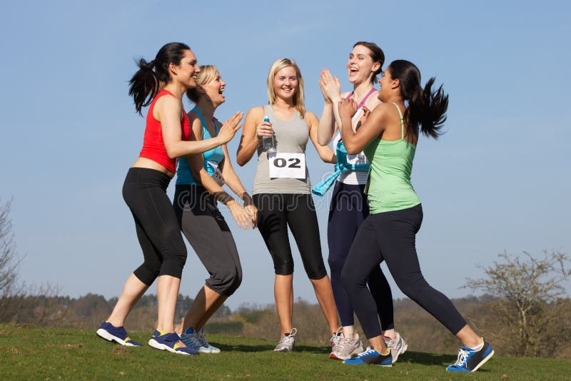 Five Female Runners Training for Race Stock Image - Image of camera ...