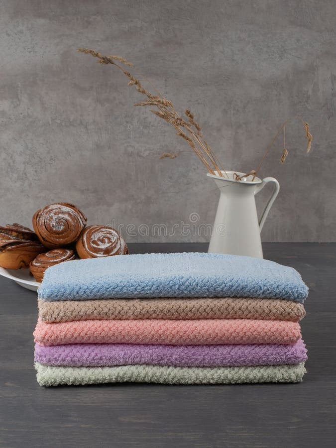 Stack of Fluffy Multi-colored Kitchen Towels on the Table. Still Life ...