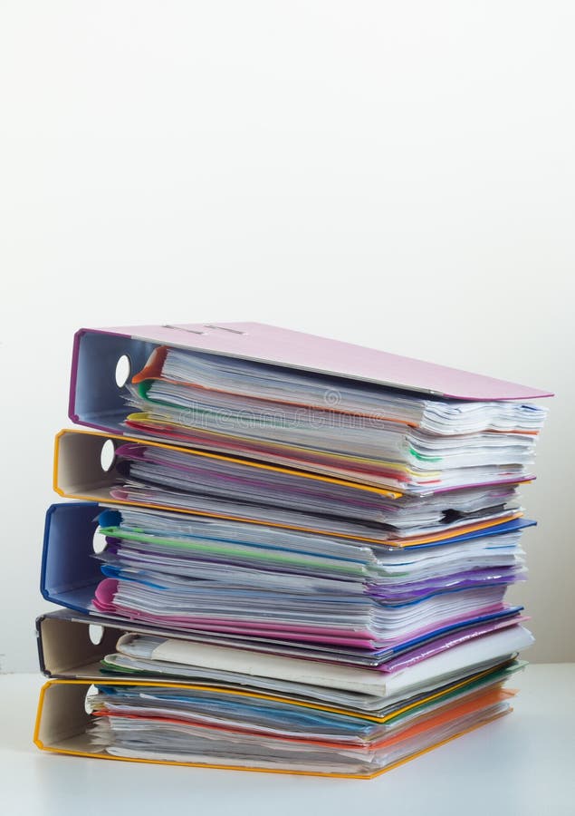 Five Folders with Documents Stacked in a Pile on the Table. Blac Stock ...