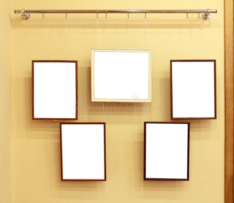 Five Frames with Canvas on the Exhibition Ledge Stock Photo - Image of ...