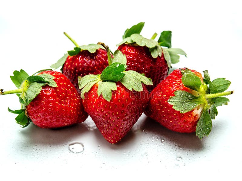 Five Fresh Ripe Strawberry on a White Surface with Water Beads Stock ...