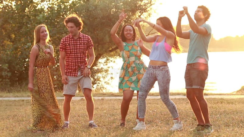 Five Friends Dancing at Sunset Stock Video - Video of happy, arms: 80373015