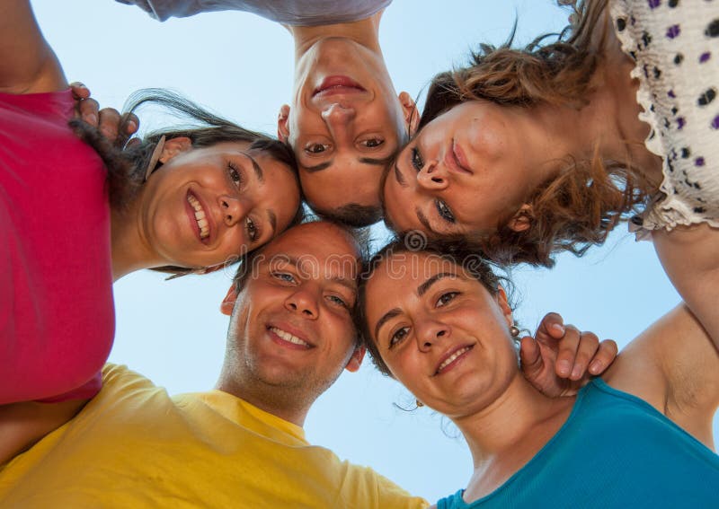 Five friends sharing a hug stock photo. Image of outside - 25776362
