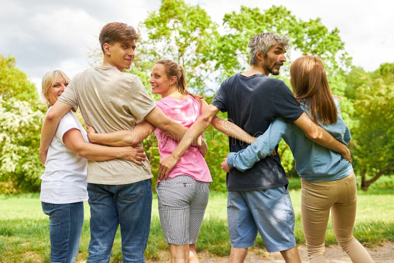 Five Friends Stand Side by Side in an Embrace Stock Image - Image of ...