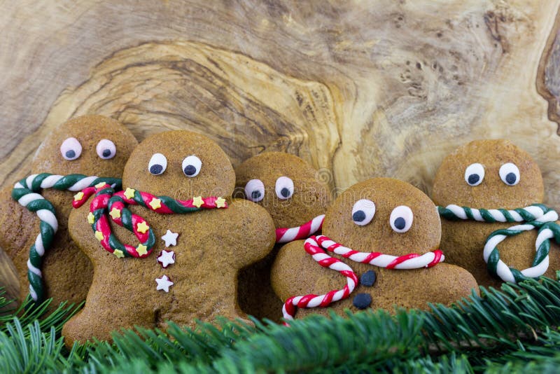 Five Gingerbread Men on Fir Branches Stock Image - Image of cookie ...