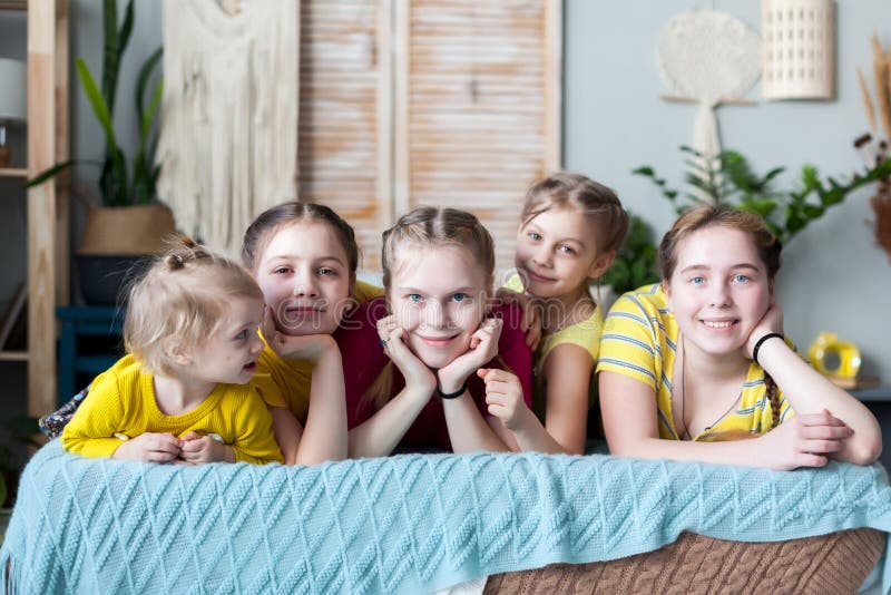 Portrait of Five Sisters on Bed Stock Photo - Image of friendship, cute ...