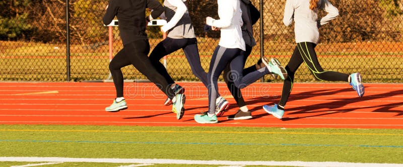 Five Girls Running on a Red Track Stock Photo - Image of sprinting ...