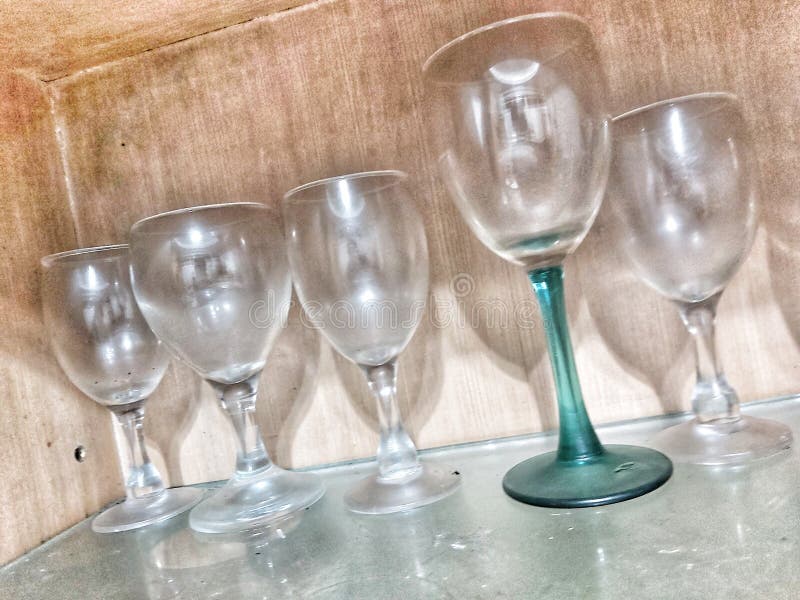 Five Glass Glasses Arranged Parallel Stock Image - Image of glasses ...