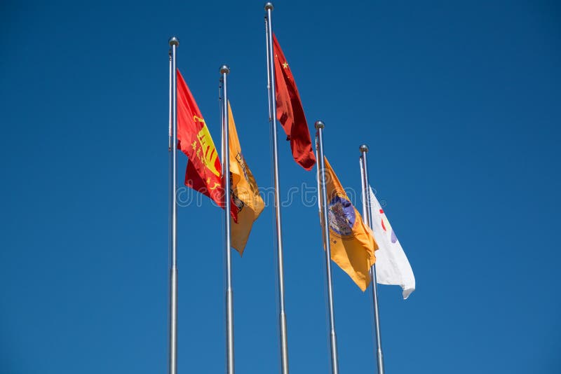 Five International Flags Blowing in the Wind Stock Photo - Image of ...