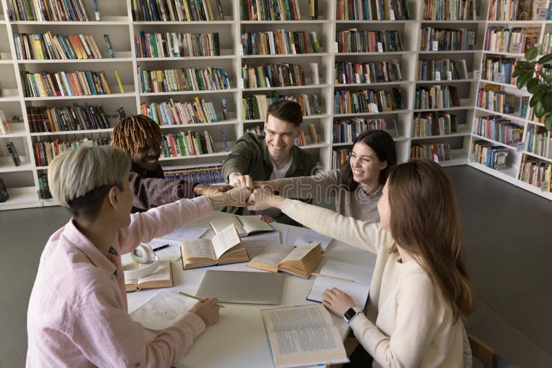 Five Joyful Students Celebrating Successful Passing of Exam in Library ...