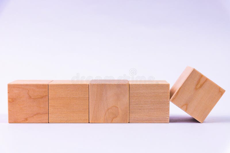Five Lying Wooden Blocks Look at the Side that Stands. Copy Space Stock ...