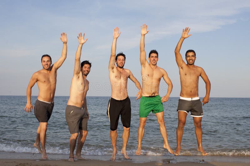 Five Men Having Fun on the Beach Stock Image - Image of freedom, adult ...
