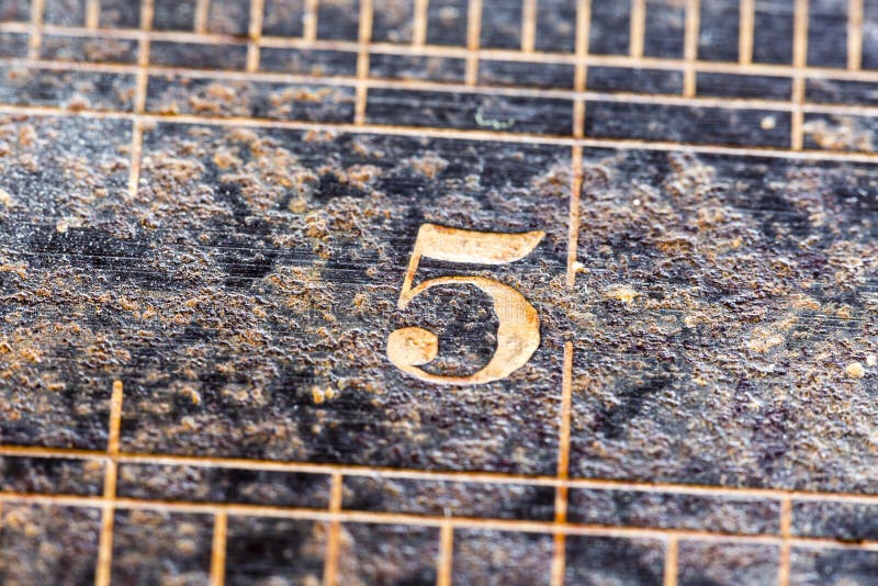 FIVE stock image. Image of inscribed, five, measure, rusty - 75109765
