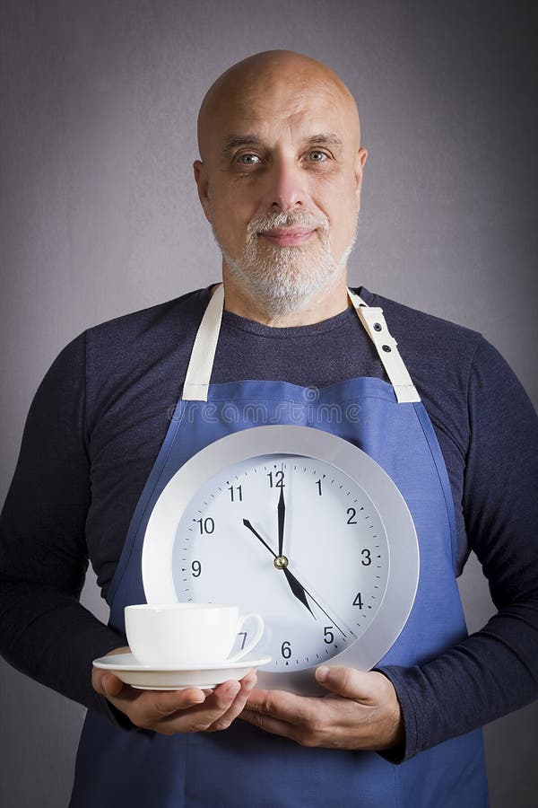 Man with a Clock and a Cup of Tea Stock Photo - Image of handsome ...