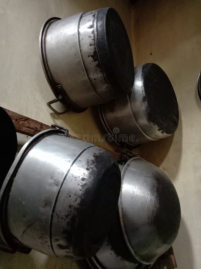 Five Pans Hanging on the Wall Stock Photo - Image of vehicle, pans ...