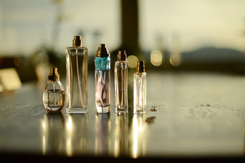 Five perfume bottles stock image. Image of fragrance, nature - 1423679