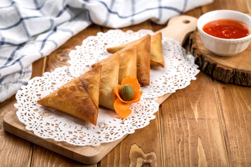Pieces of Fried Samosa with a Dipping Sauce on the Side Stock Image ...