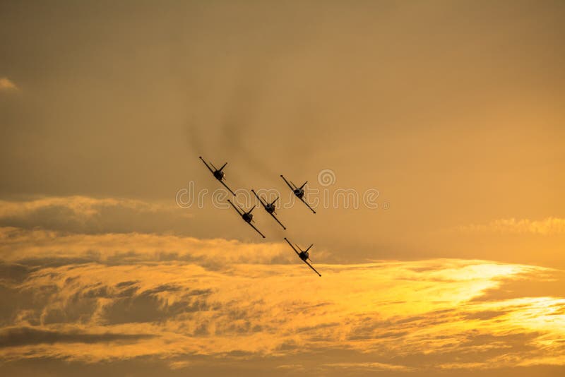 Five Planes Flying at Sunset Stock Image - Image of five, flight: 55685757