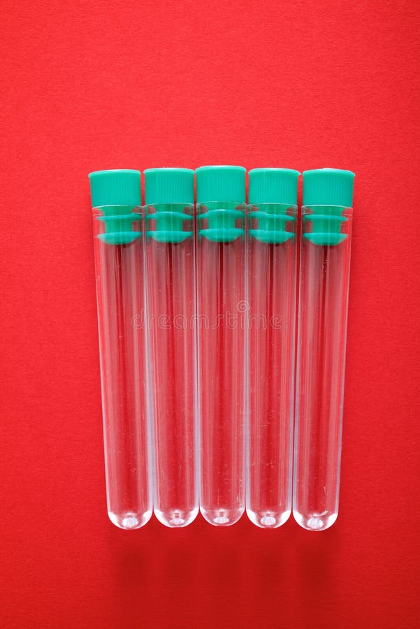 Five Plastic Test Tubes on a Red Surface Stock Image - Image of people ...