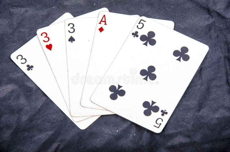 Five Playing Card`s a Hand of a Three of a Kind Three`s and a Ace and a ...