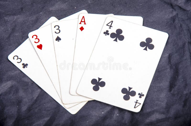 Five Playing Card`s a Hand of a Three of a Kind Three`s and a Ace and a ...