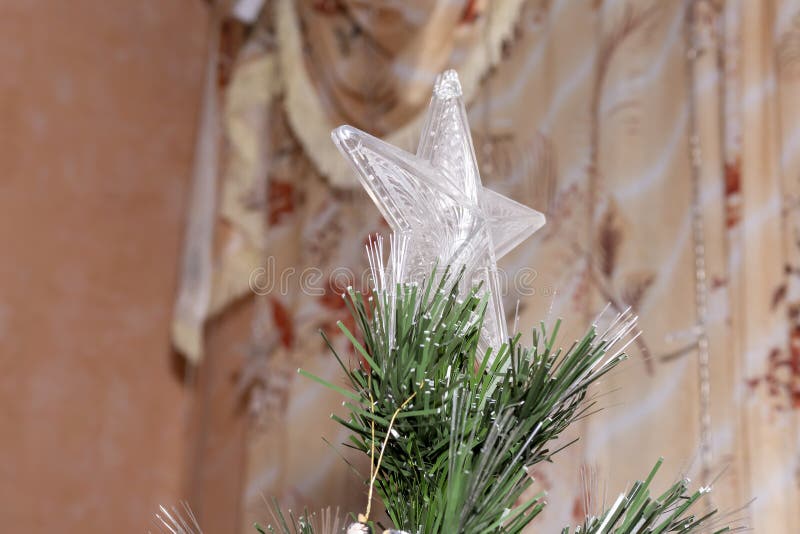 Five Pointed Star at the Top of the Christmas Tree. Stock Photo - Image ...