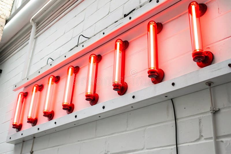 Five Red Neon Bulbs on White Wall Stock Illustration - Illustration of ...