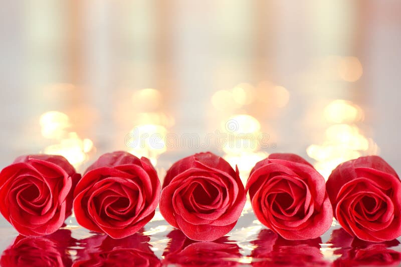 Five Red Roses in a Line with Reflection Stock Photo - Image of ...